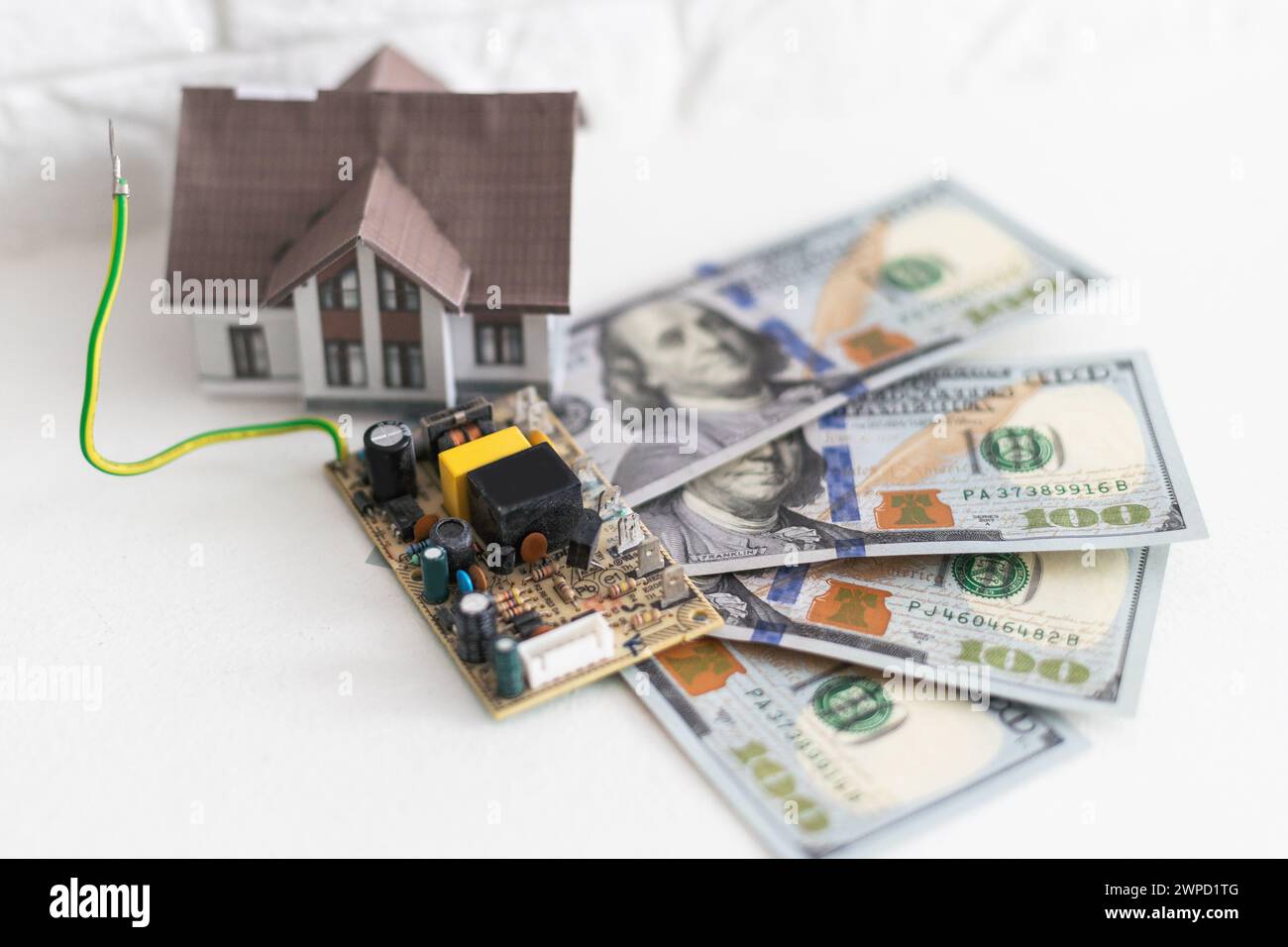 money and an electronic chip Stock Photo - Alamy