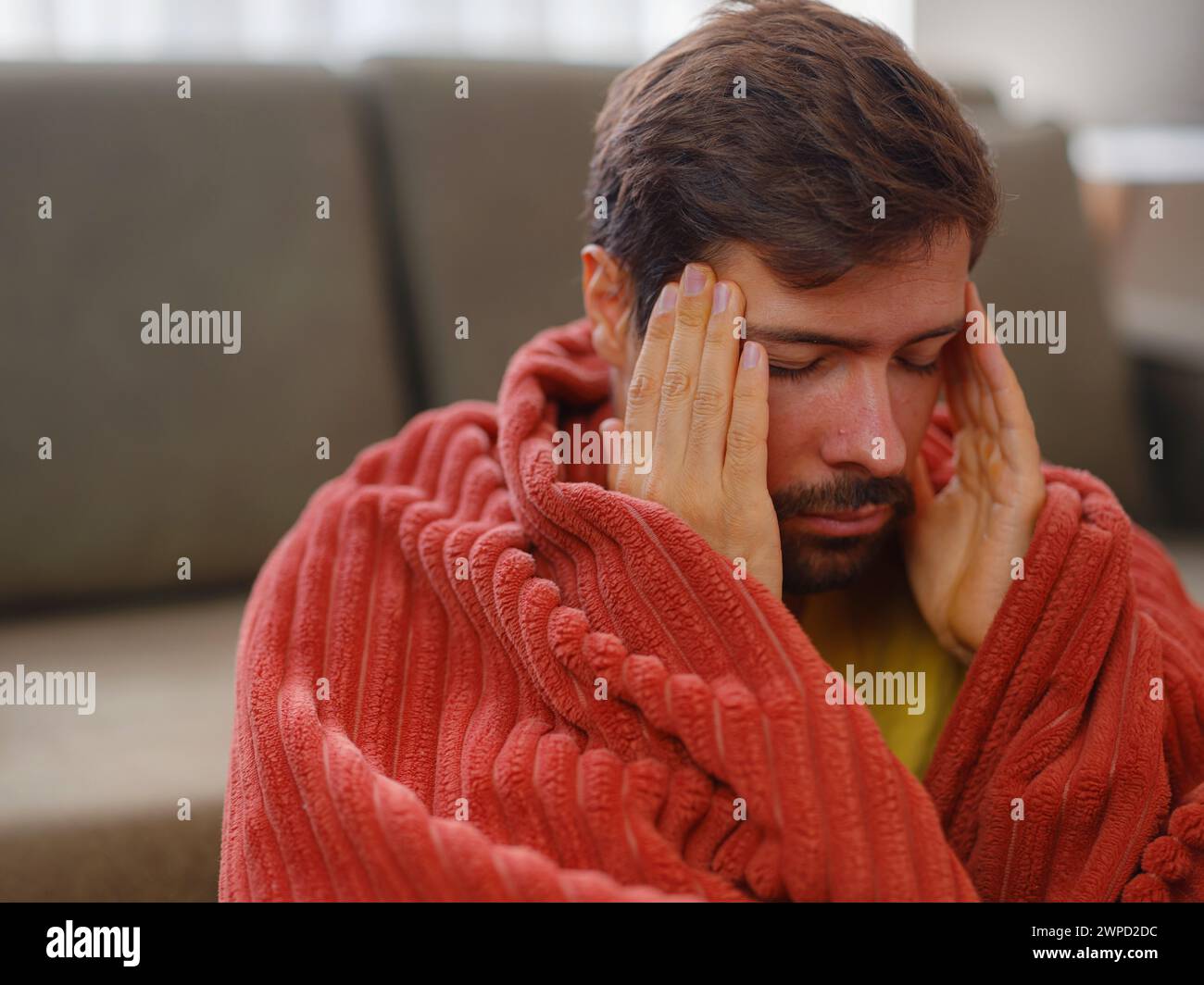 autumn and winter season of sneezes. Young Caucasian man with flu feels ...