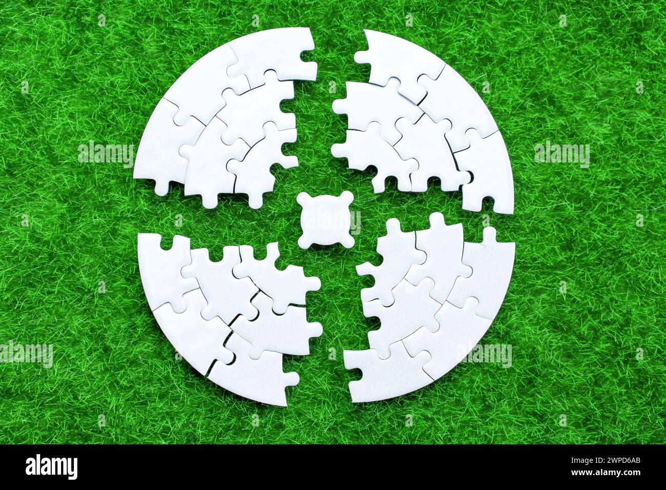 Blank circular puzzle split into four sectors arranged around the ...