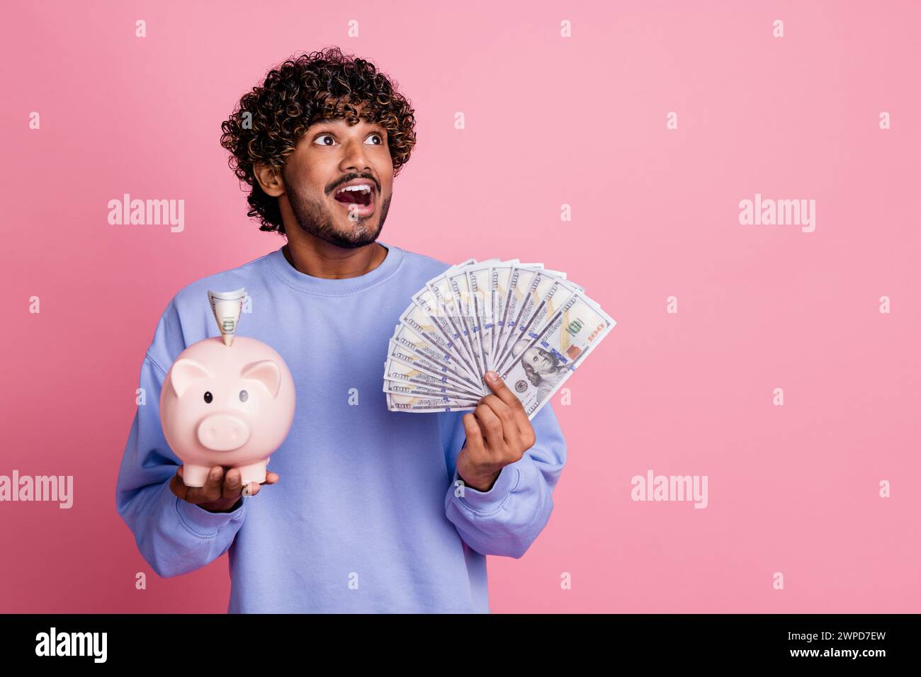 Photo of cheerful excited glad rich man collect money look empty space ...