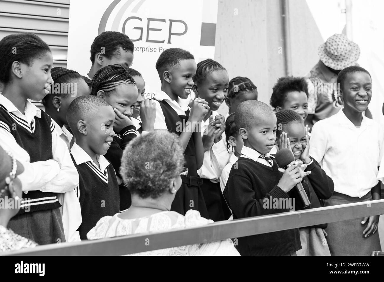 A group of children standing together during a ceremony in Johannesburg ...