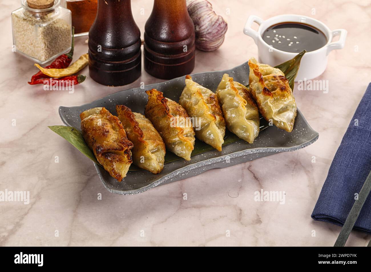 Fried Japanese stuffed dumplings - Gyoza with meat Stock Photo - Alamy