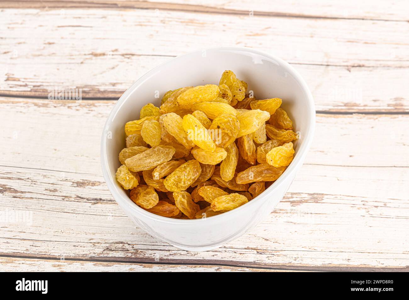 Yellow raisin - dry grape sweet berries Stock Photo - Alamy