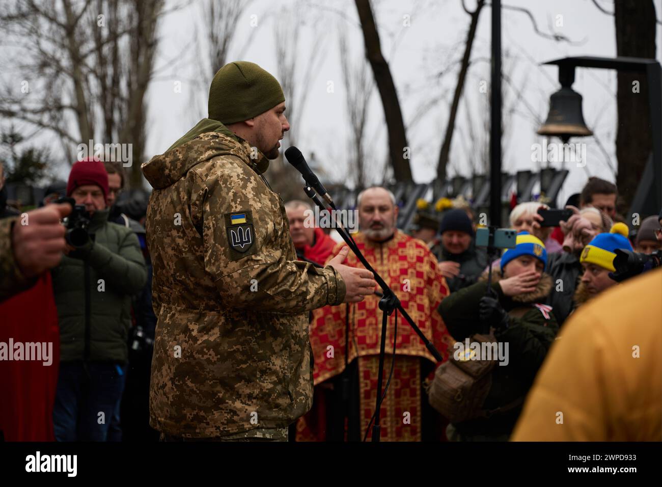 Ukrainian soldiers speaking at the memorial ceremony on Day of the ...