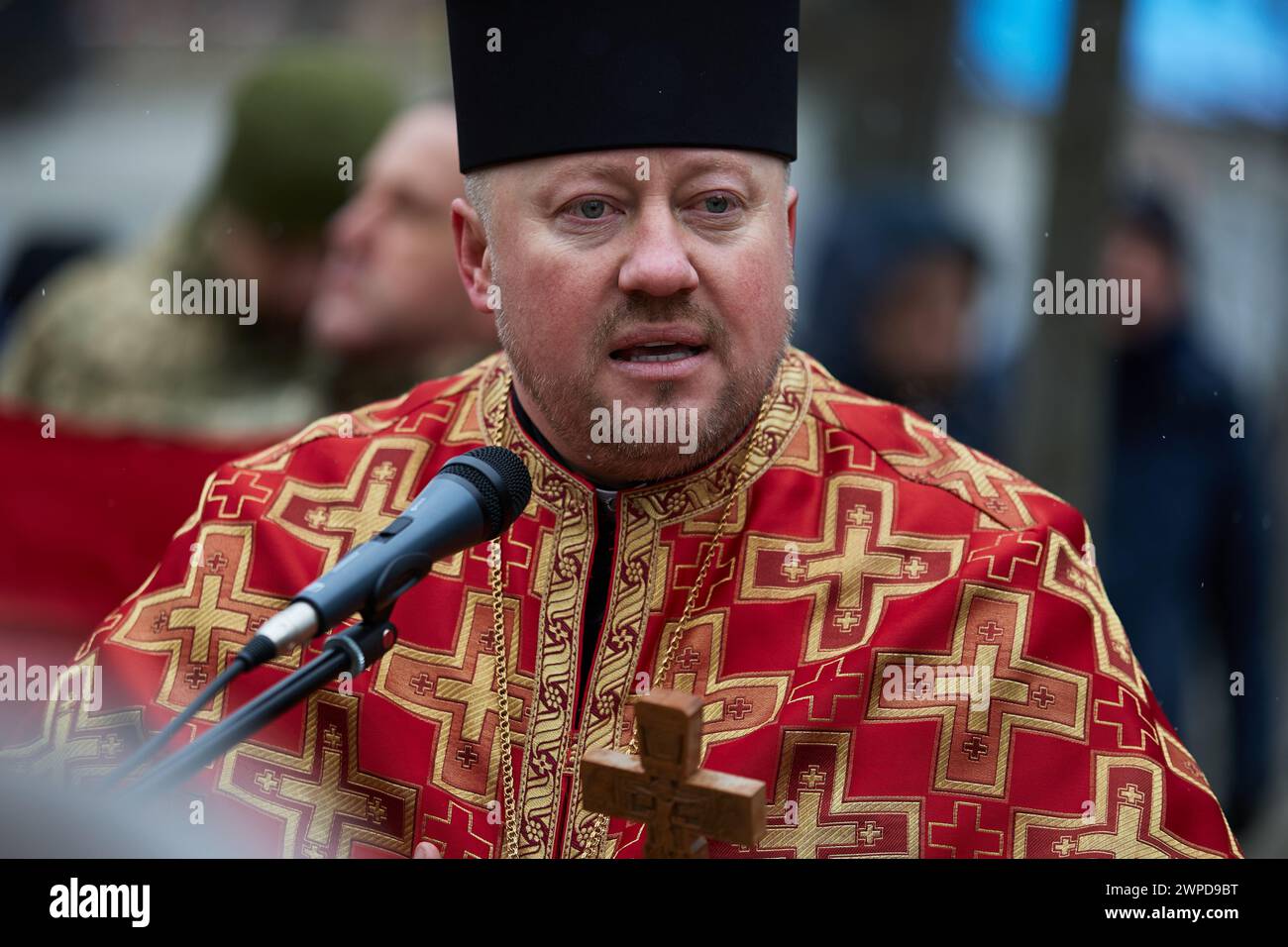 Ukrainian priest of Orthodox Church of Ukraine says a prayer on a ...