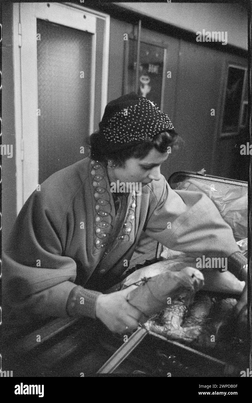 Travelers are pictured during luggage control at Warsaw Airport foreign ...
