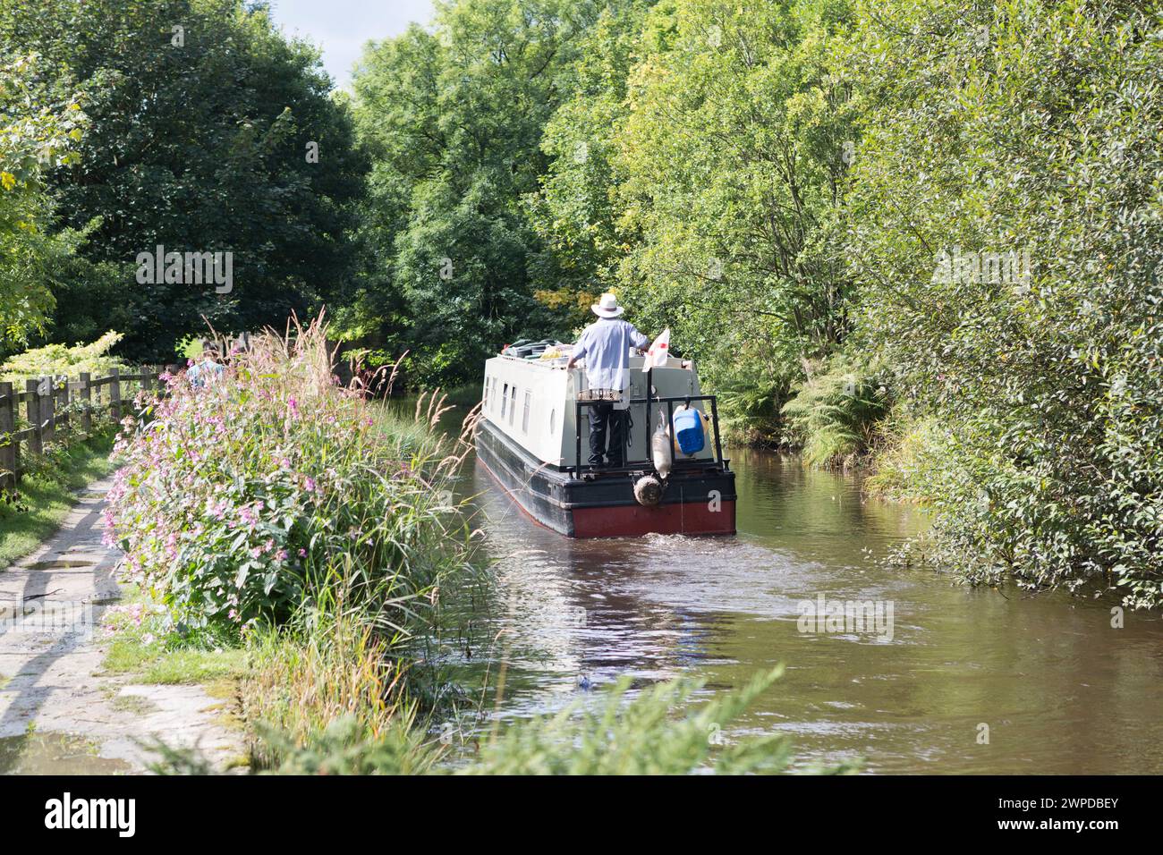 UK, West Yorkshire, canal boat on the Huddersfield Narrow canal from ...