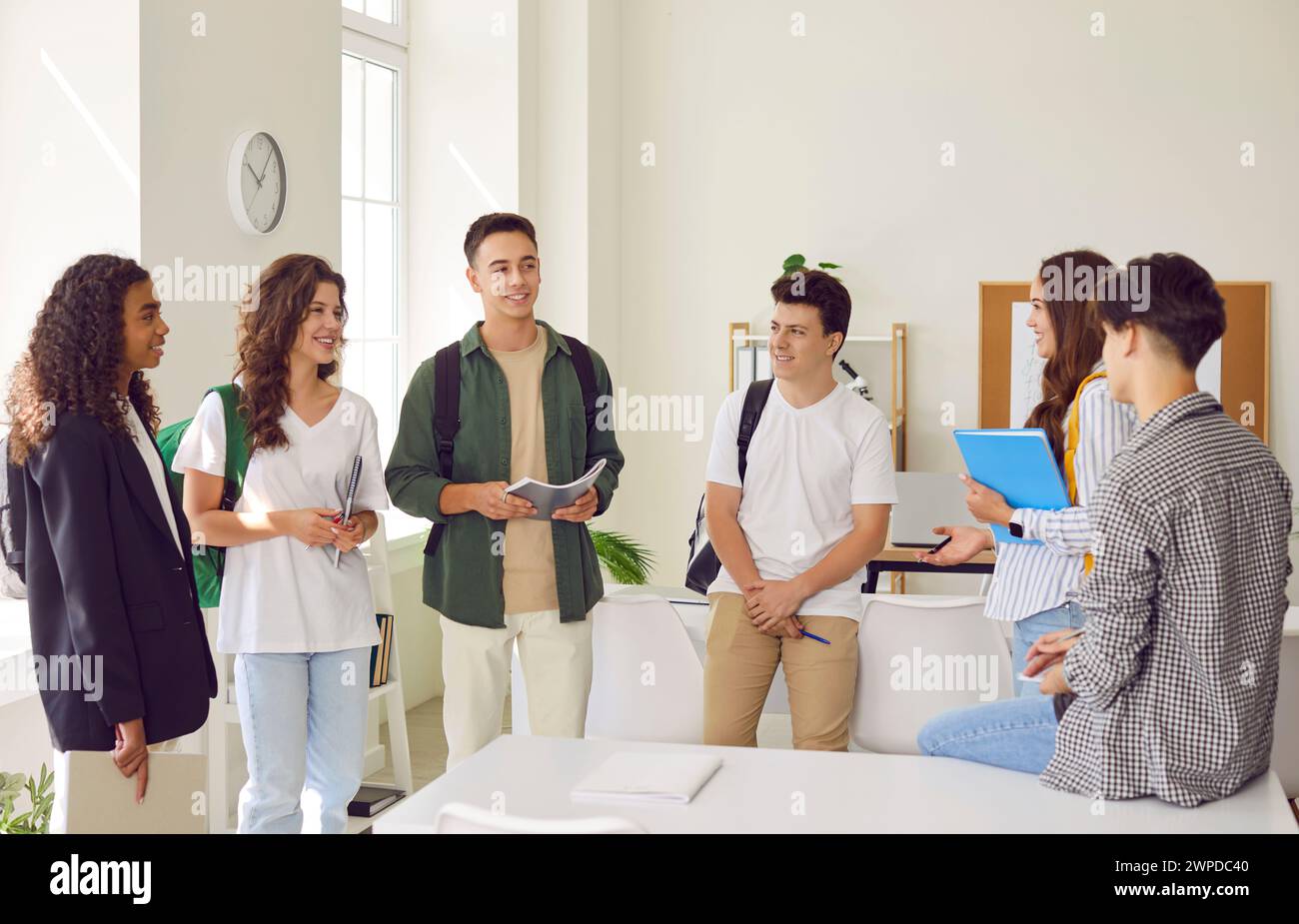 Teen boy talking classroom hi-res stock photography and images - Alamy