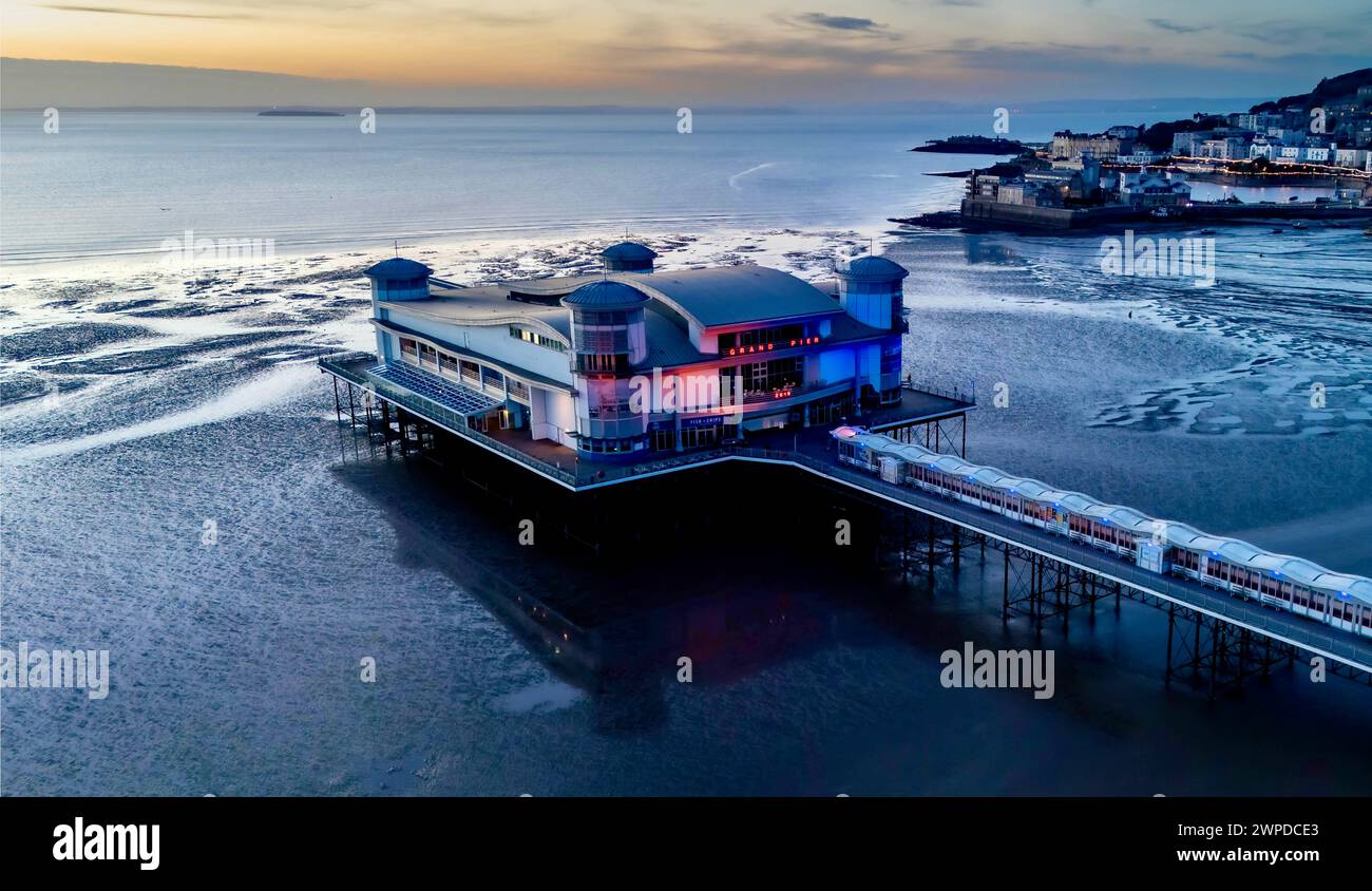 An aerial view of the Weston-Super-Mare Pier, just after sunset in ...