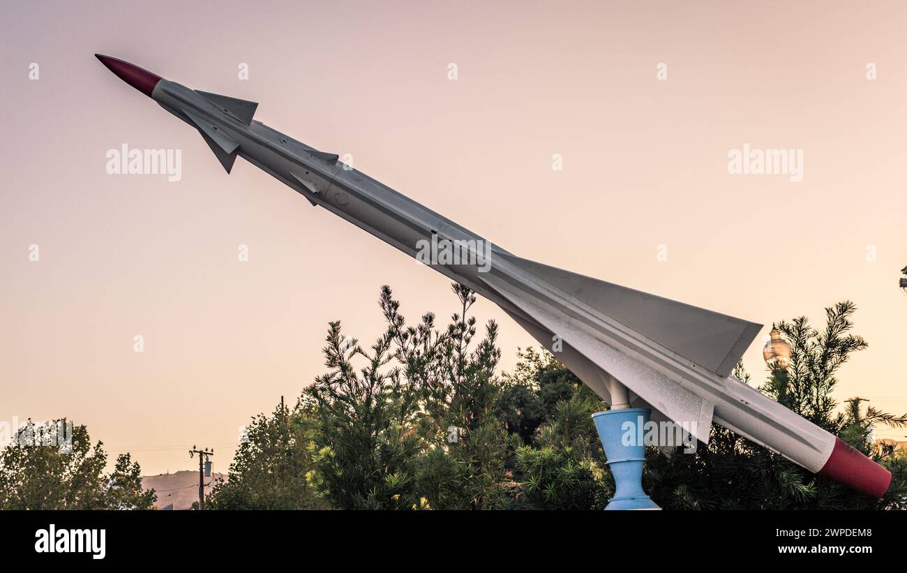 Abstract rocket-shaped sculpture with red fin, artistic concept Stock ...