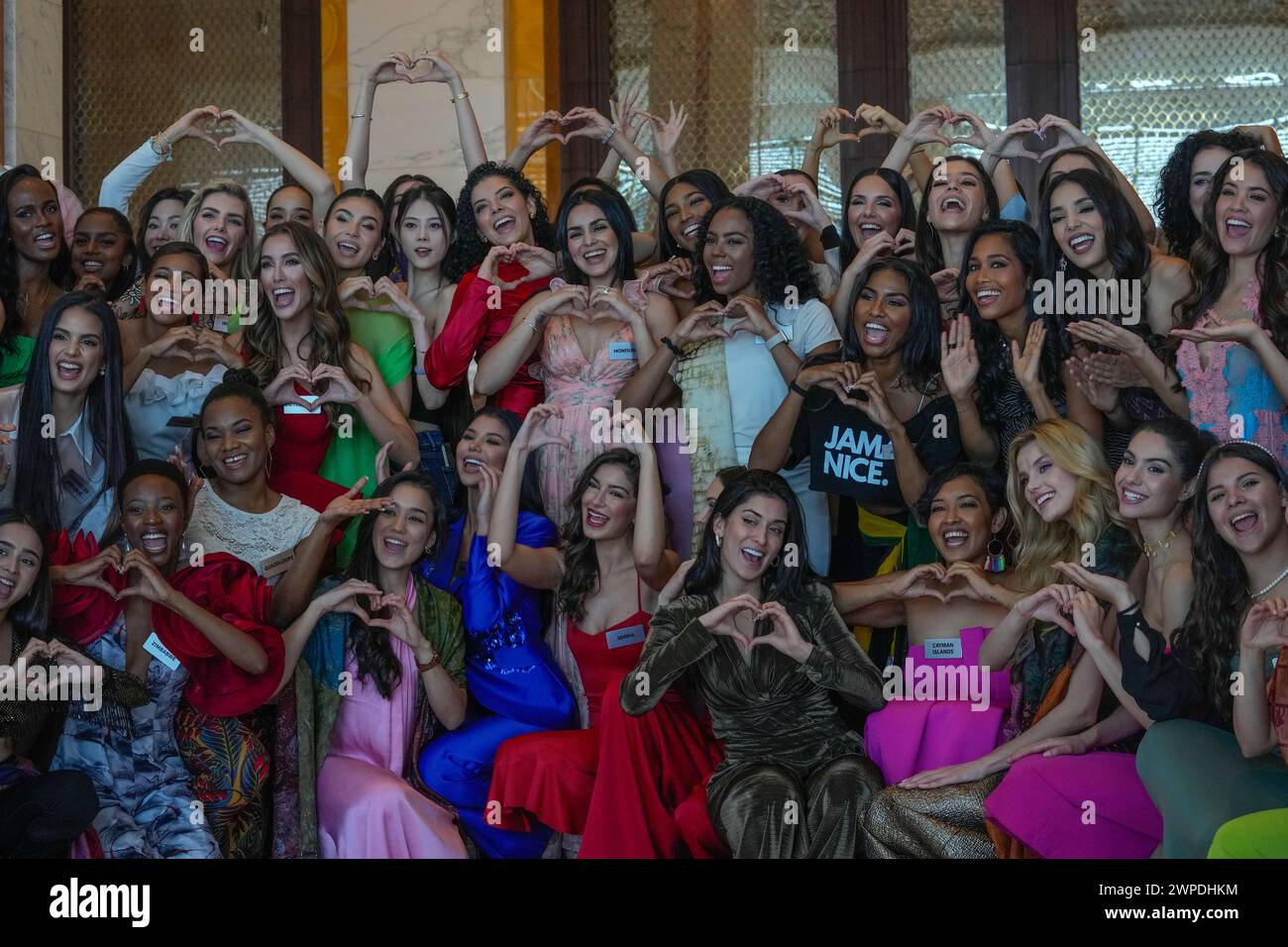 Contestants of the 71st Miss World pageant pose for photographs at an ...