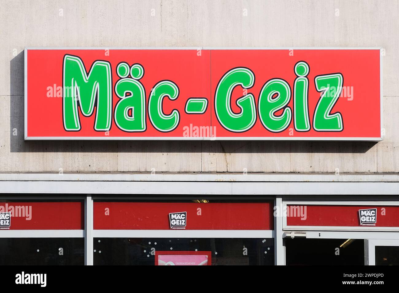 Berlin, Germany, 2 March 2024, Mäc Geiz logo above shop on Kottbusser ...