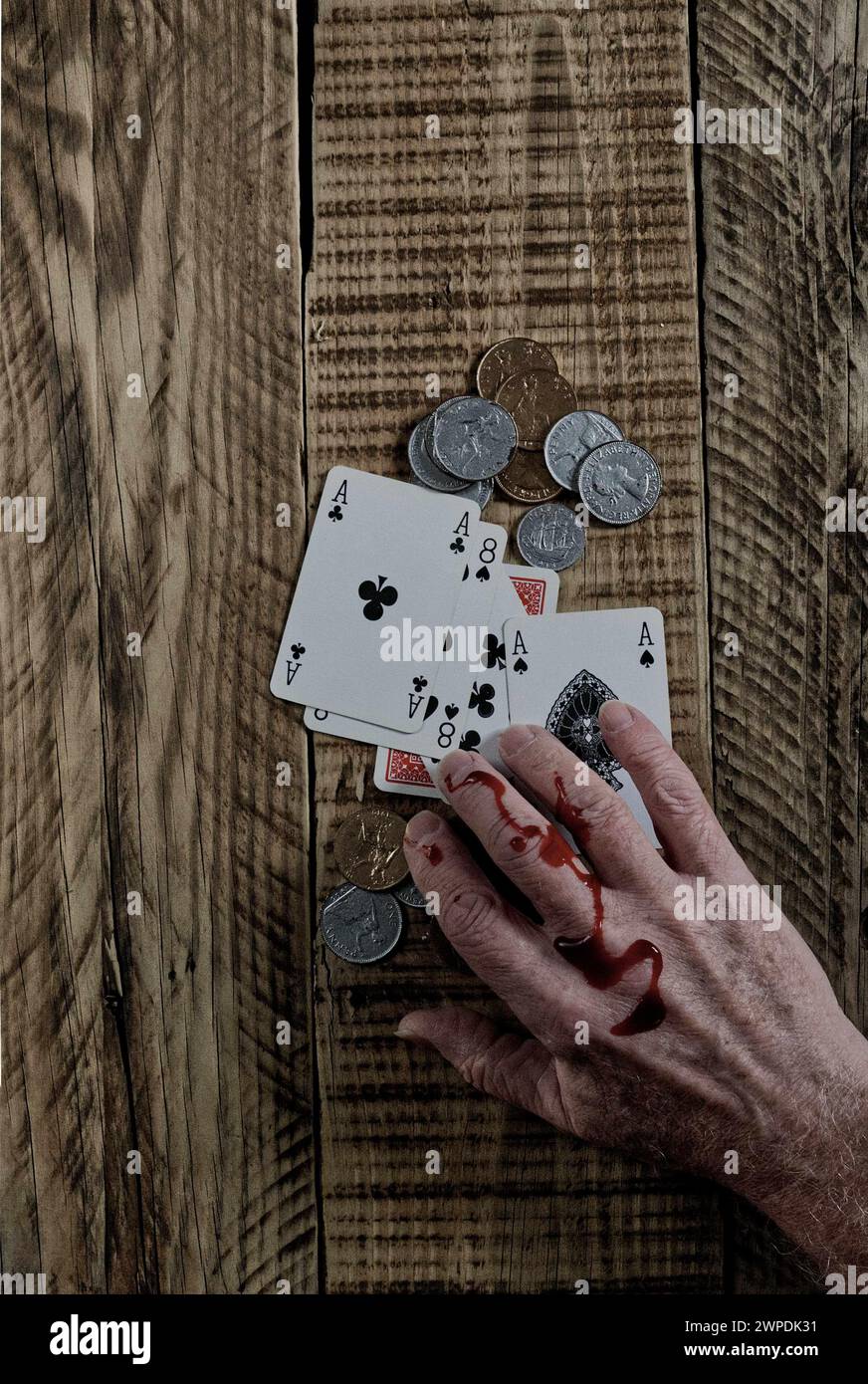 Dead mans hand playing cards aces and eights on wooded background. with ...