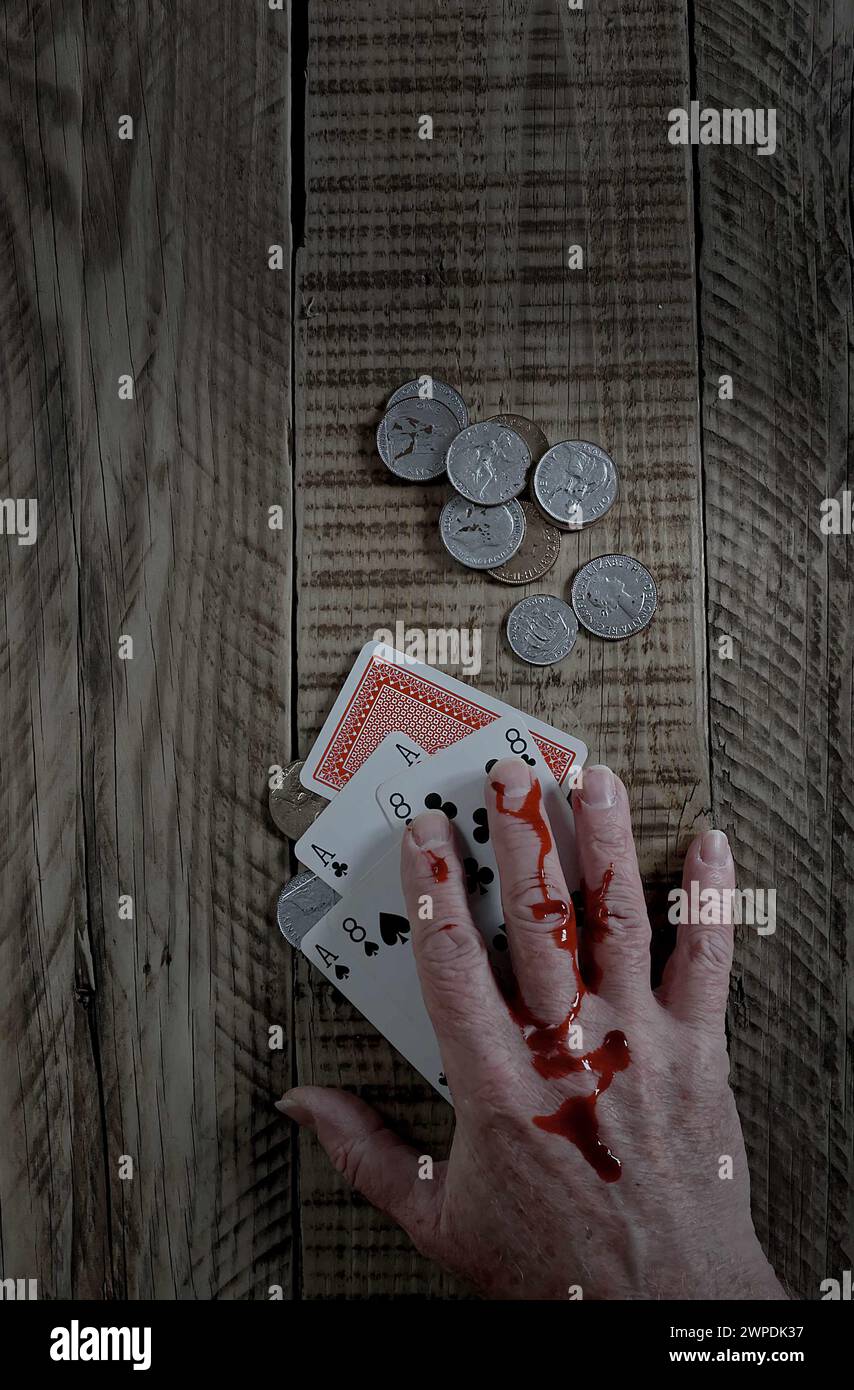 Dead mans hand playing cards aces and eights on wooded background. with ...