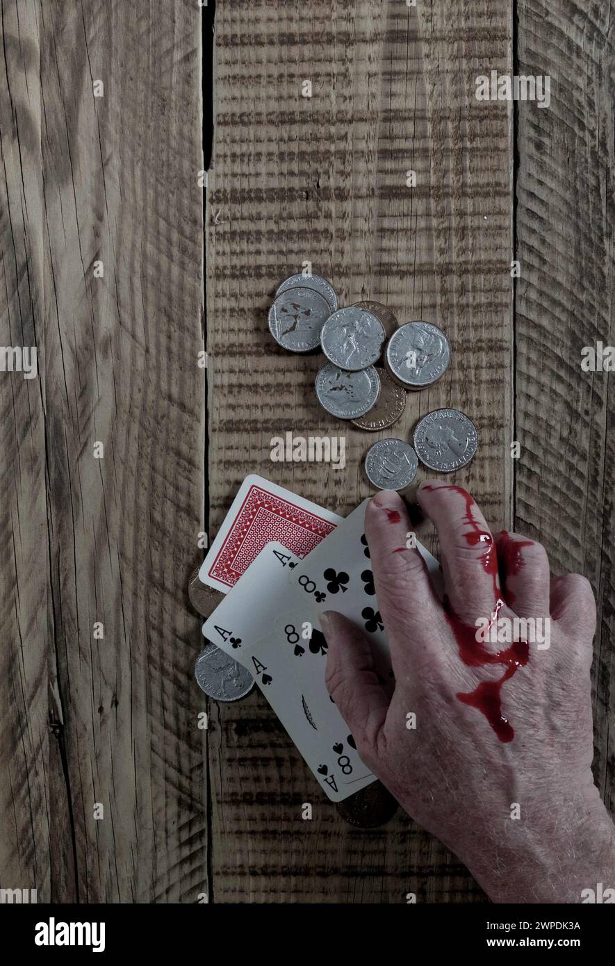 Dead mans hand playing cards aces and eights on wooded background. with ...