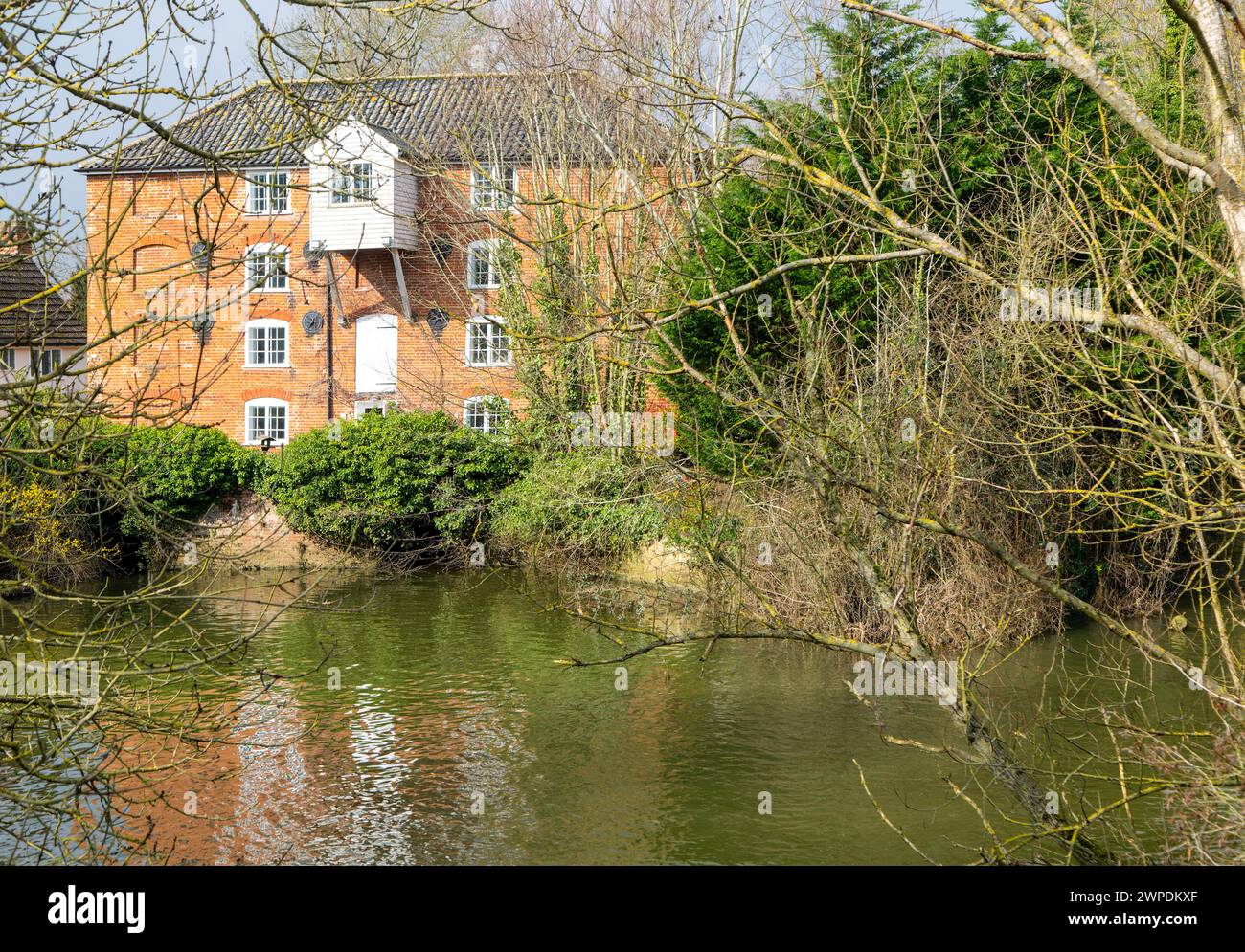Historic watermill mill house and pond, Sproughton, Suffolk, England ...