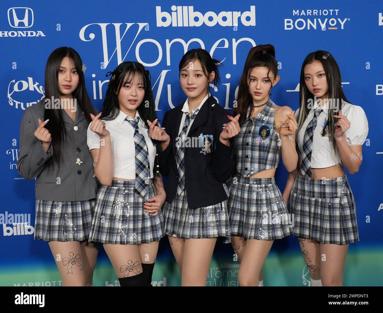 Los Angeles, USA. 06th Mar, 2024. (L-R) NewJeans - Hyein, Hanni Pham ...