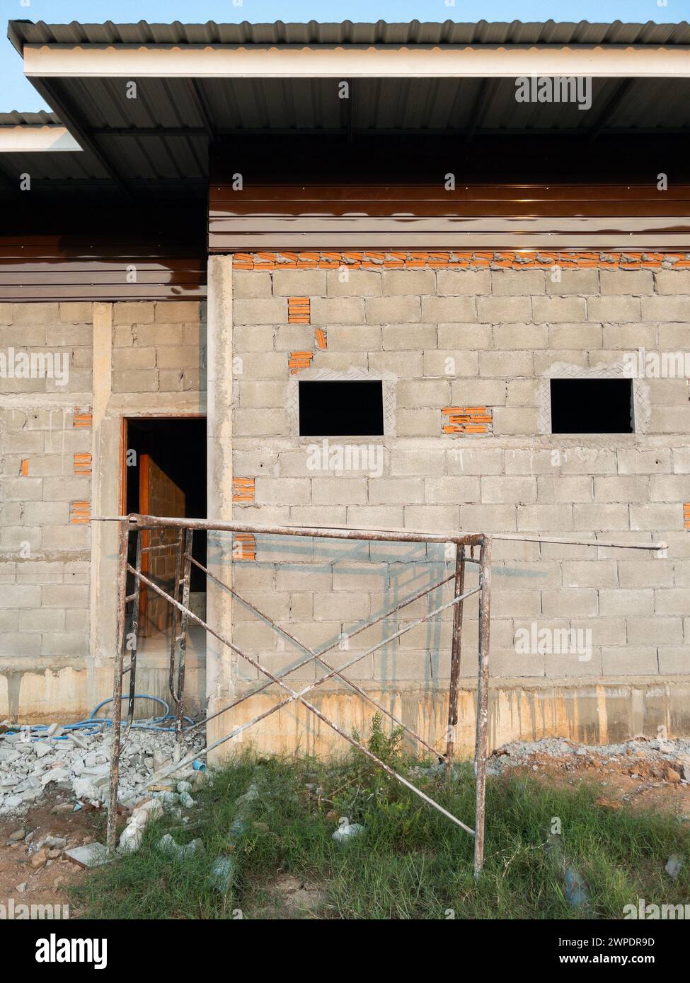 Old scaffolding used for plastering the backside of a house under ...