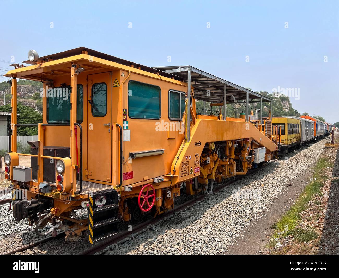 The ballast tamping machine is parking after works to maintain the ...
