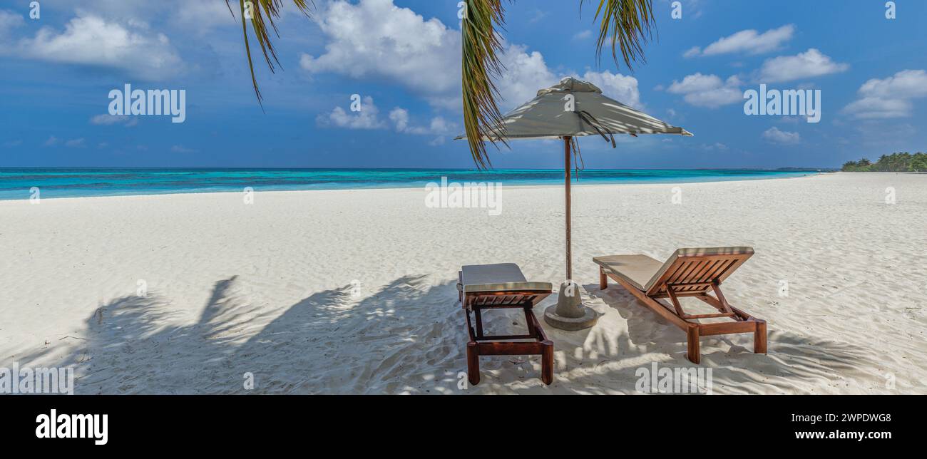 Tropical beach couple background as summer landscape with lounge chairs ...