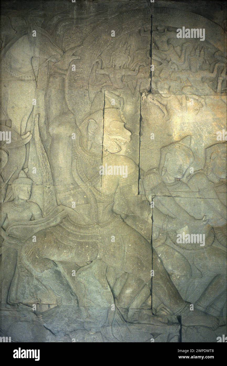 Relief of Churning of the Sea of Milk carving showing deity and devas ...