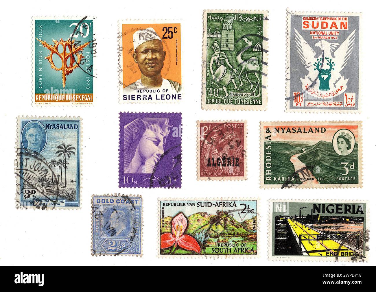 A montage of vintage postage stamps from Africa isolated on a white ...