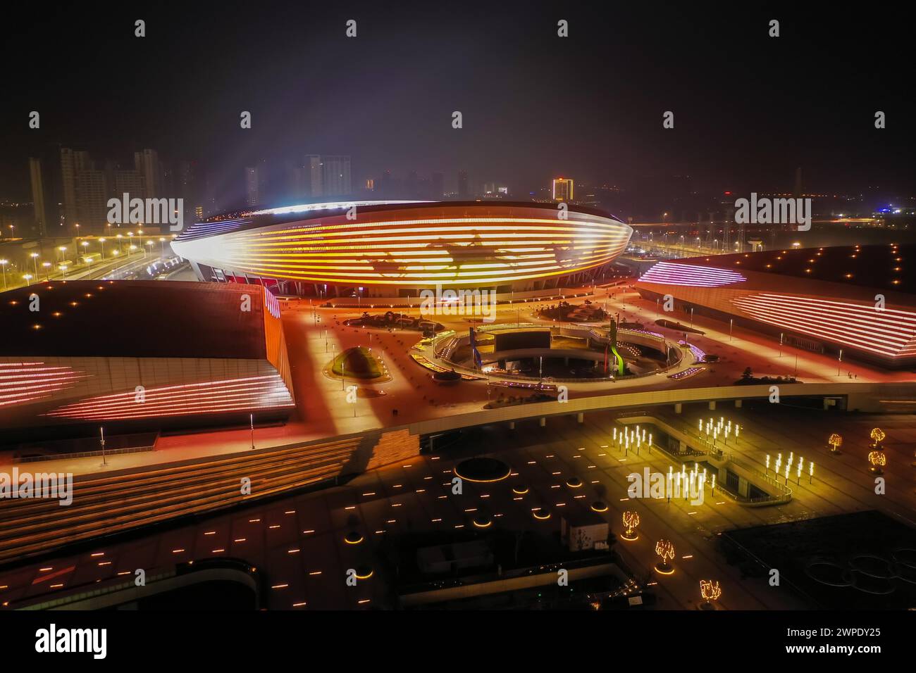 Aerial photo shows the night view of Zhengzhou Olympic Sports Centre ...