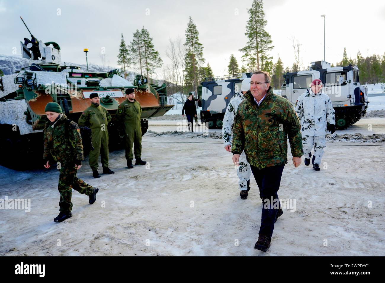 German Defense Minister Boris Pistorius, right, arrives to greet ...