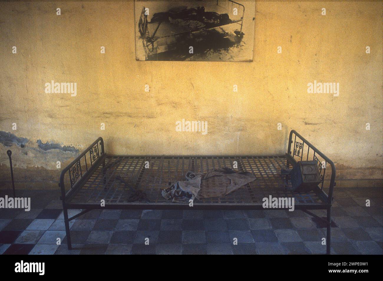 Prisoner bed with photograph of victim chained up to bed, taken in 1997 ...