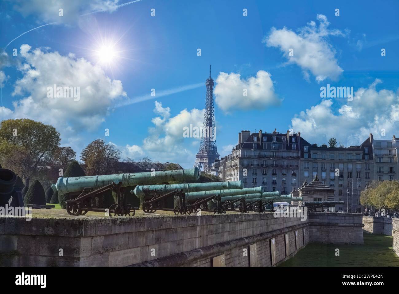 Paris, the esplanade des Invalides, with cannons, and the Eiffel Tower ...