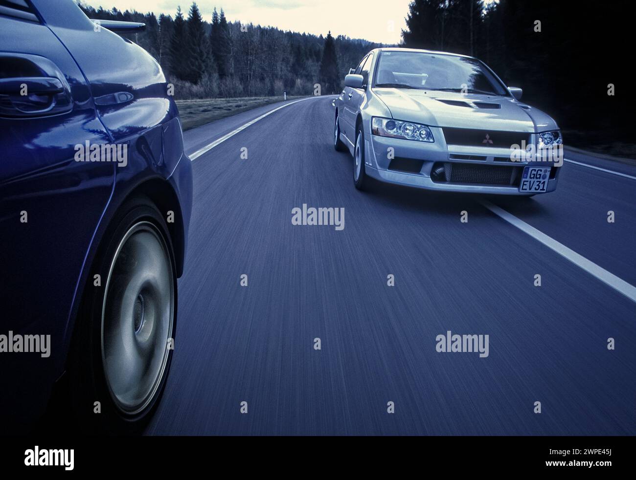 Subaru Impreza Turbo WRX and Mitsubishi Lancer Evo Stock Photo - Alamy