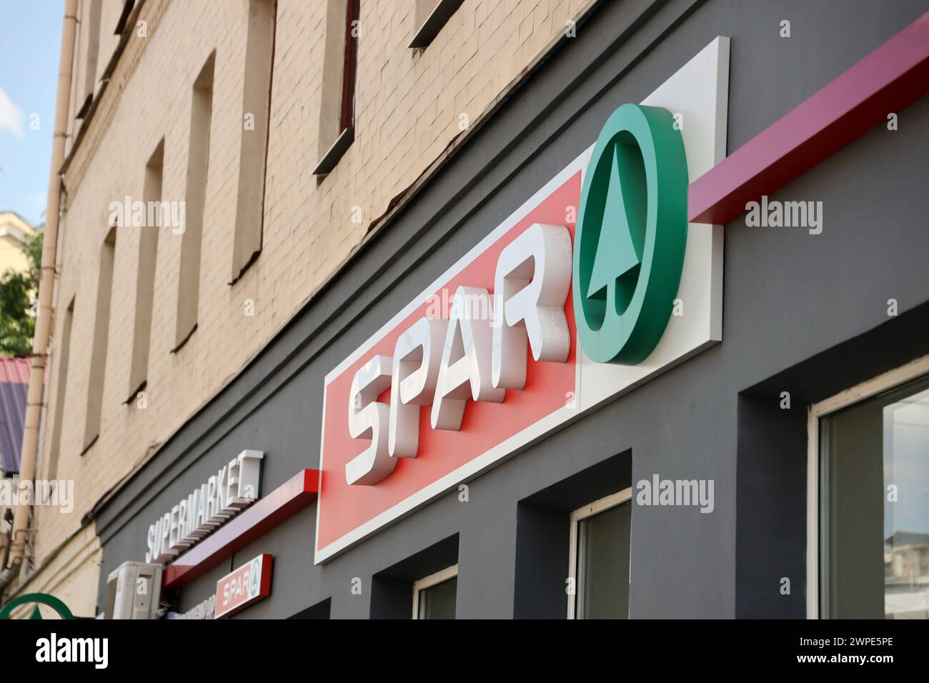 KHARKIV, UKRAINE - AUGUST 29, 2021 Spar logo on a wall. Spar is an ...
