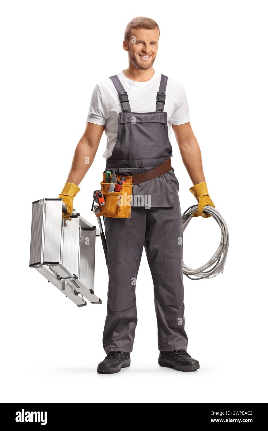 Electrician in a uniform carrying a ladder and a cable isolated on ...