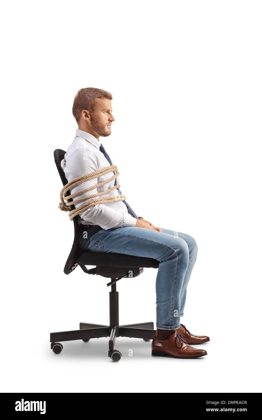 Tied to a chair Cut Out Stock Images & Pictures - Alamy