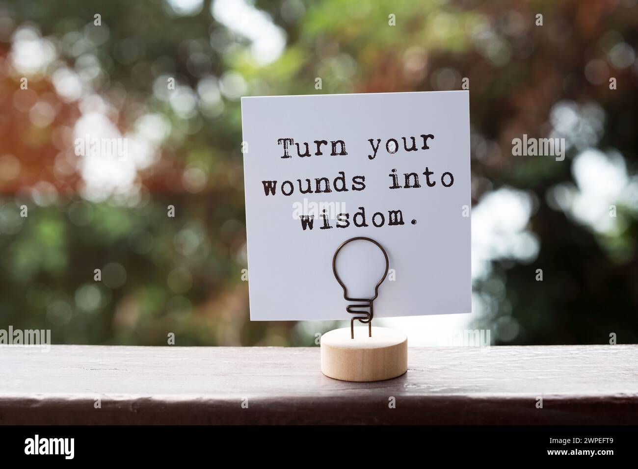 Paper note with inspirational quotes turn your wounds into wisdom Stock ...
