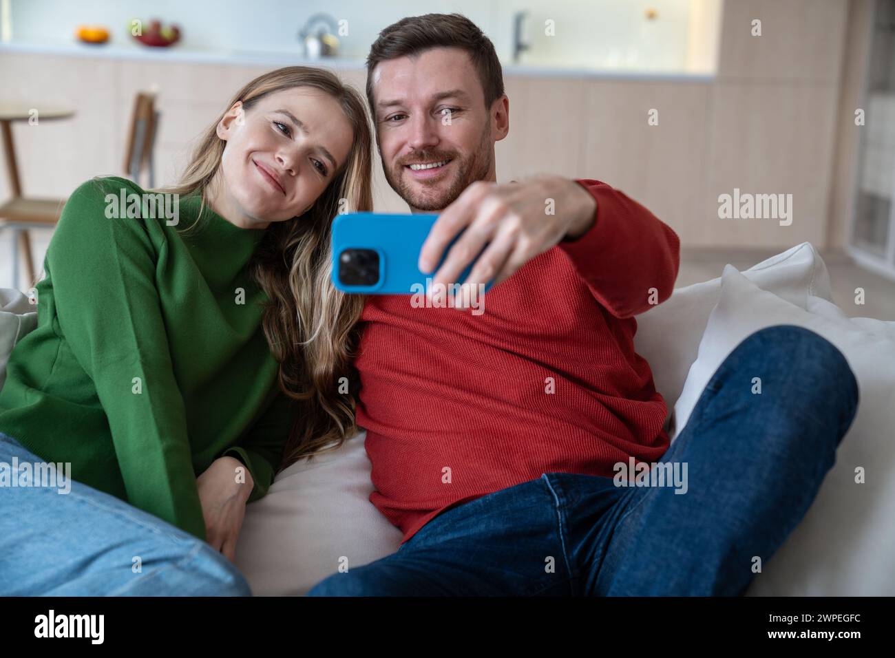 Pleased Couple In Love Take Selfies Together For Social Media On