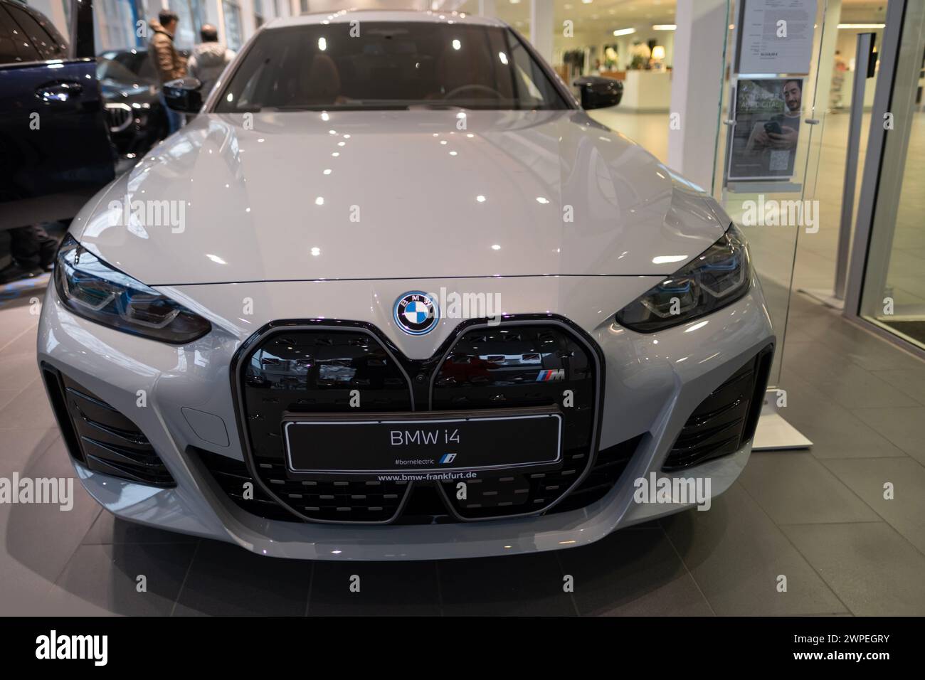 grey BMW i4 five-door electric liftback class D, German manufacturer ...