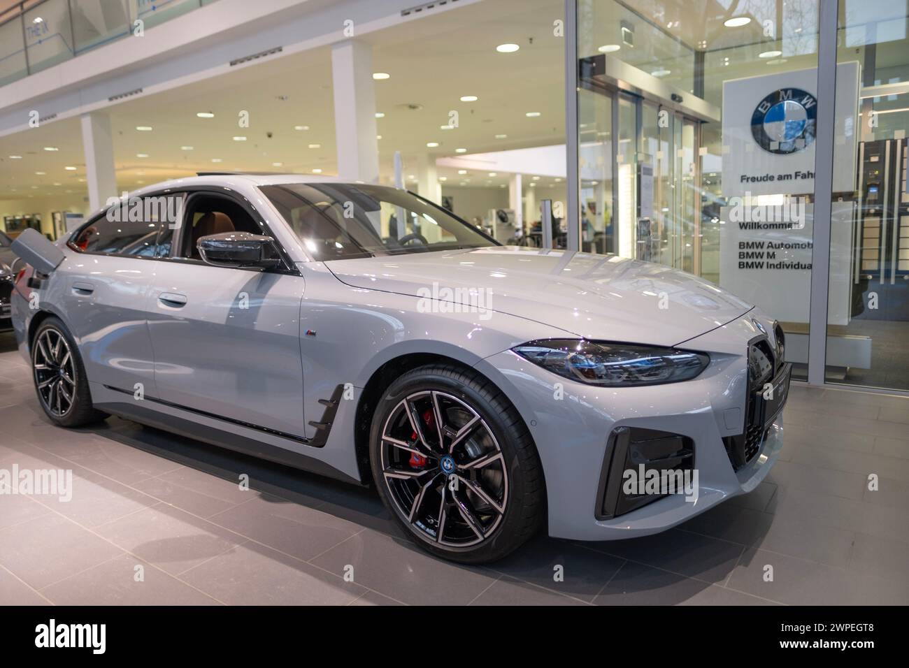 grey BMW i4 five-door electric liftback class D, German manufacturer ...