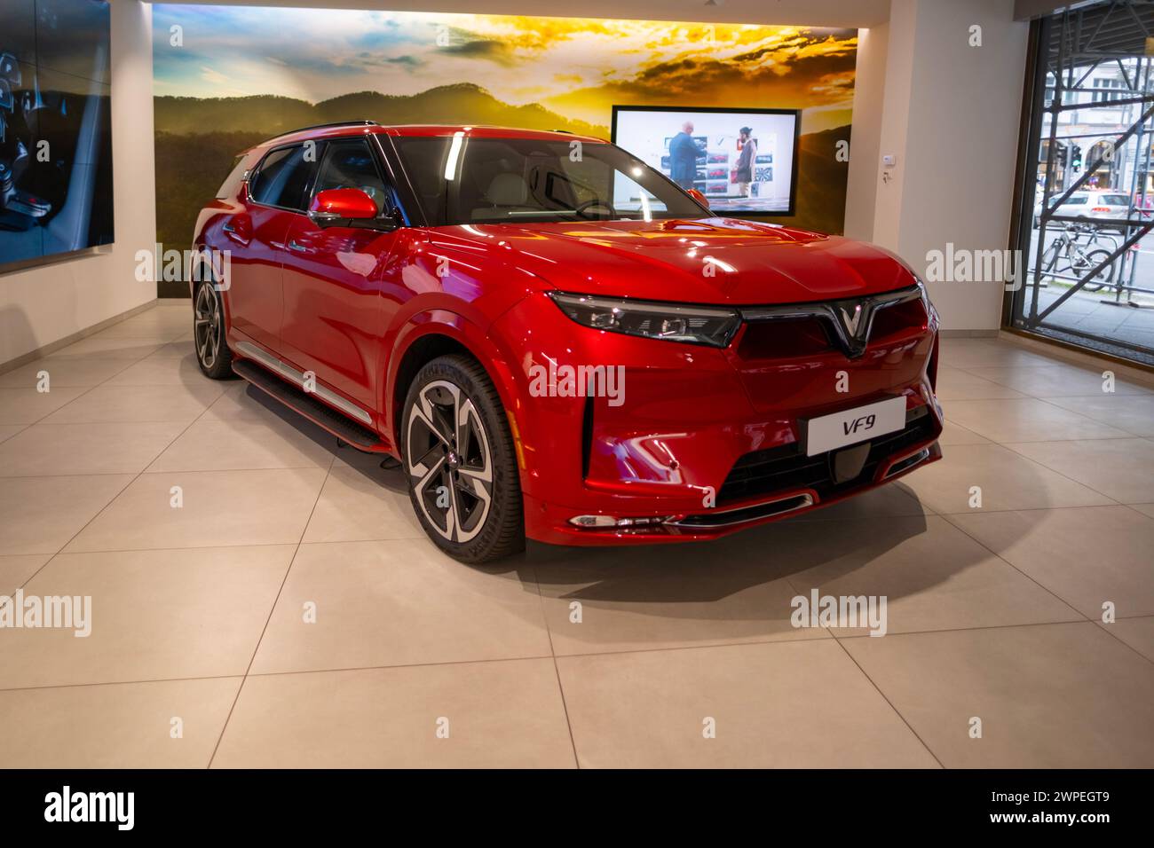 new red Vinfast vf 9 electric SUV in Studio, advanced technologies in ...