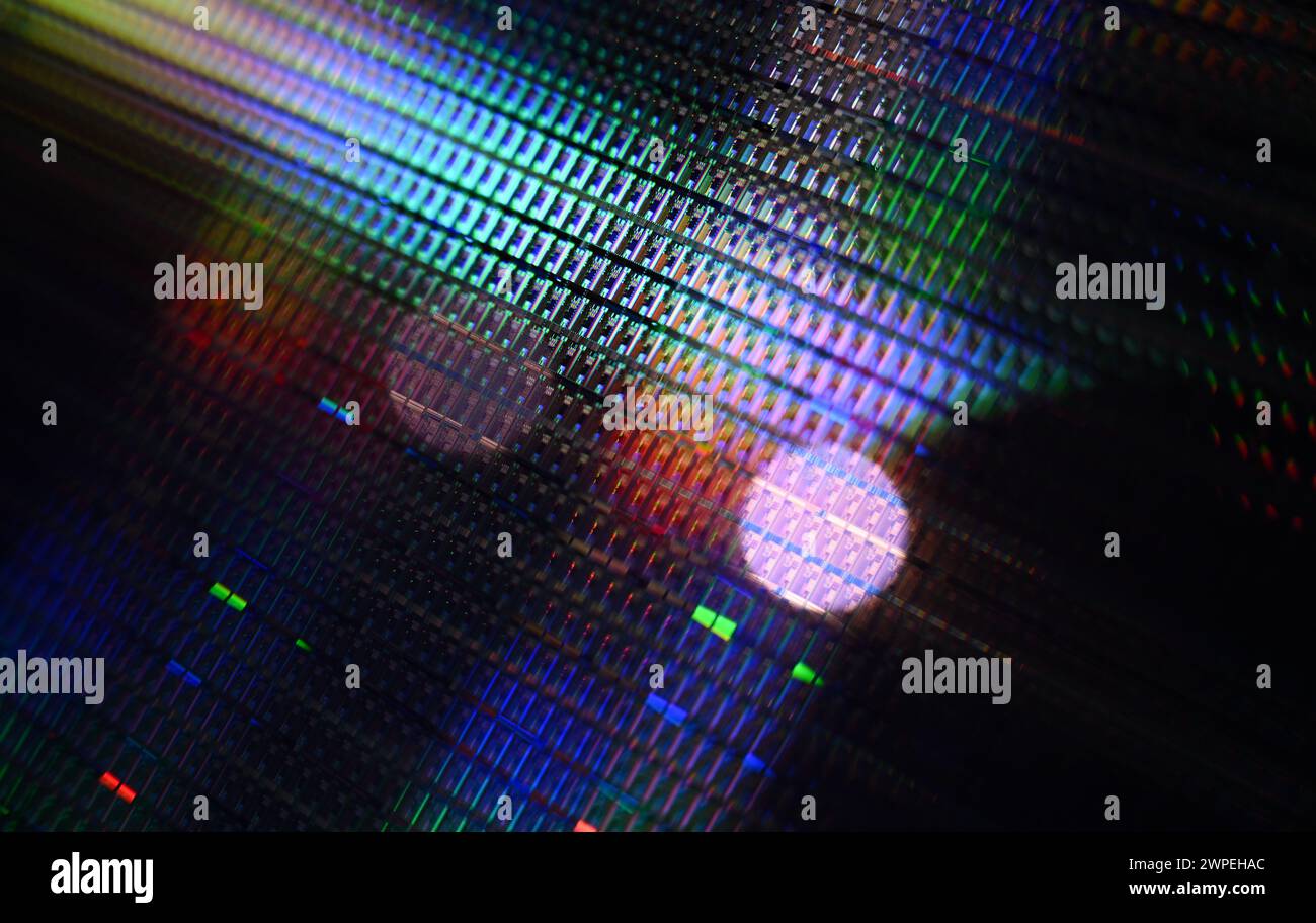 Darmstadt, Germany. 07th Mar, 2024. A coated wafer for chip production ...