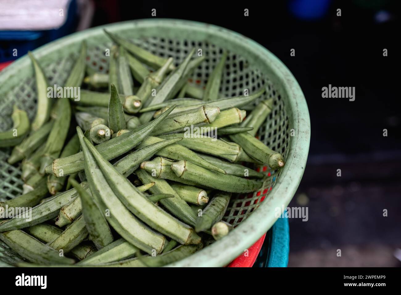 Lots of fresh and green and organic Okra (Lady Finger) in basket at a ...