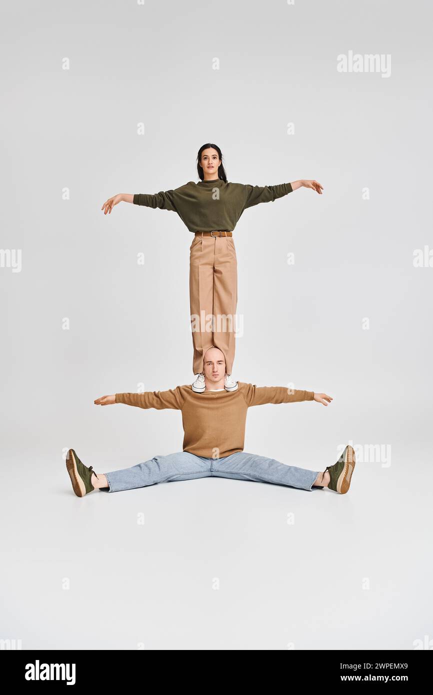 Standing on shoulders hi-res stock photography and images - Alamy