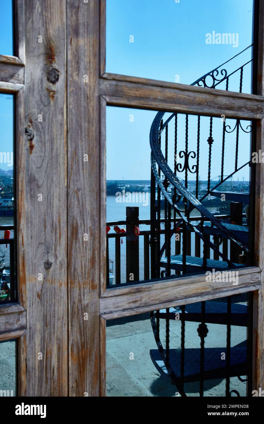 colorful buildling with fancy stairs and spiral steps in relection of ...