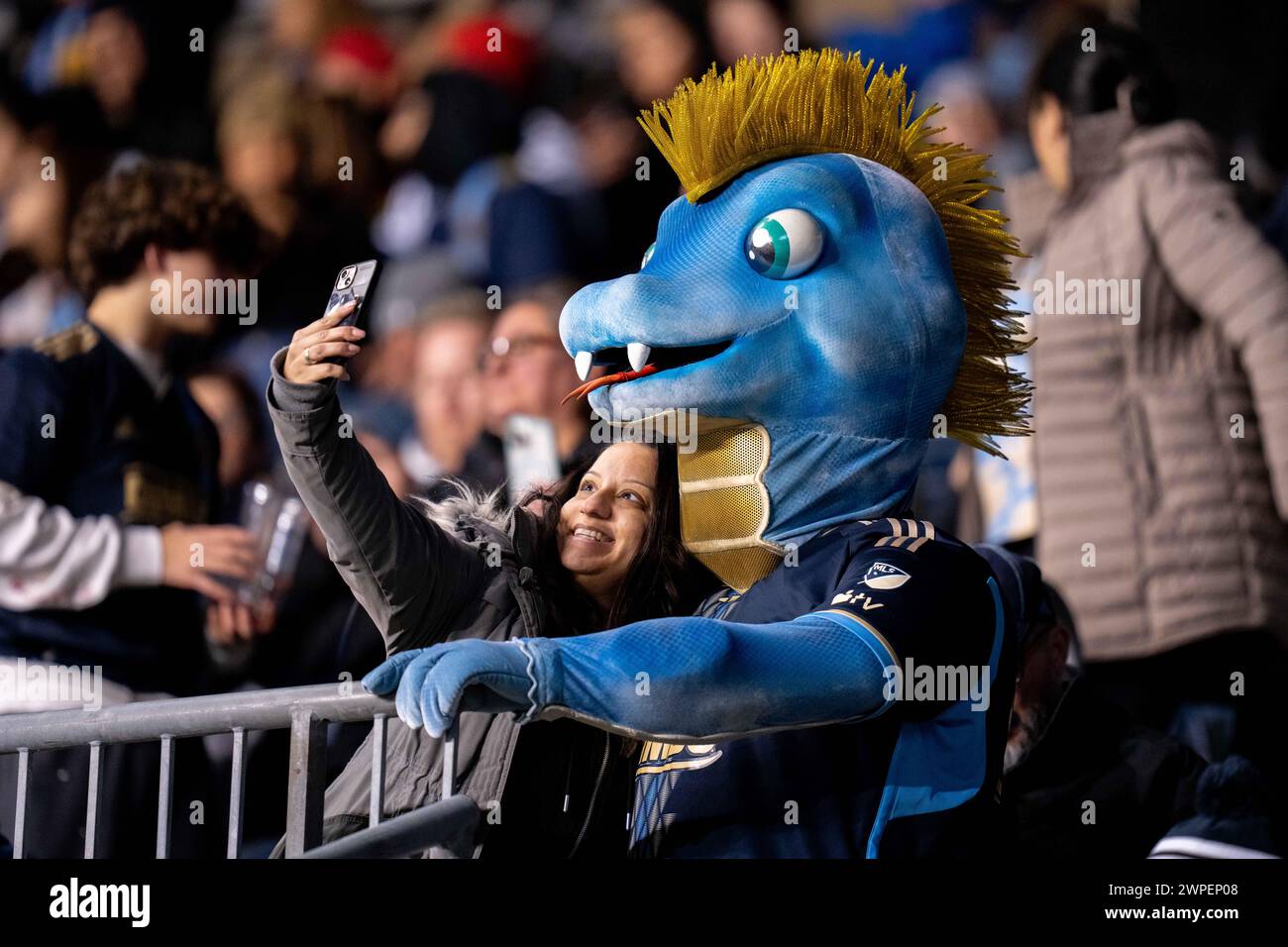 Chester, Pennsylvania, USA. 05th Mar, 2024. A fan poses for a selfie ...