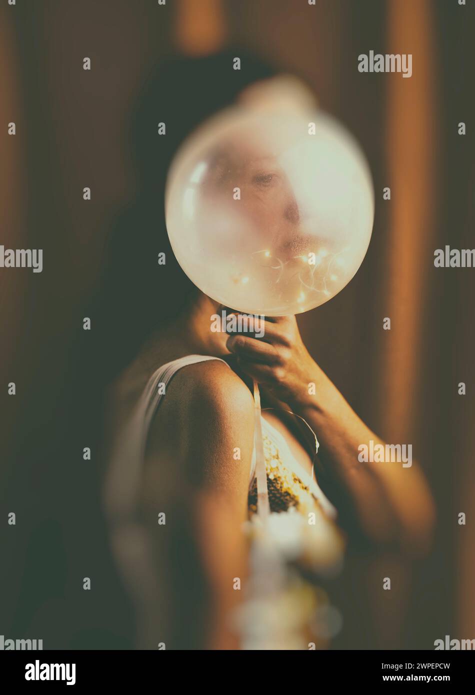 woman behind an illuminated balloon III , spain Stock Photo - Alamy
