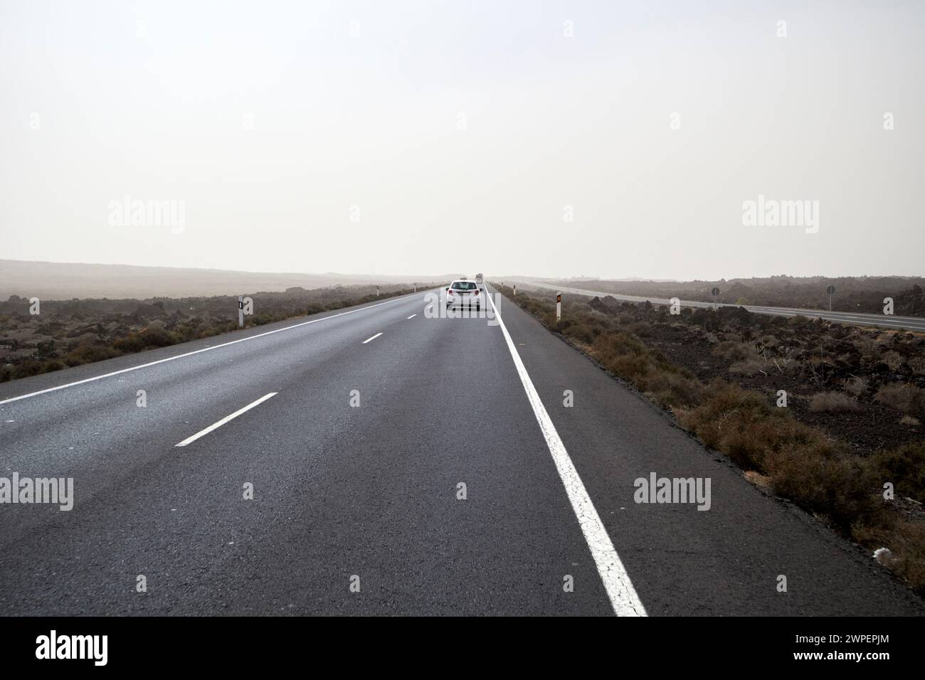 driving along the lz-2 road towards playa blanca during a calima dust ...