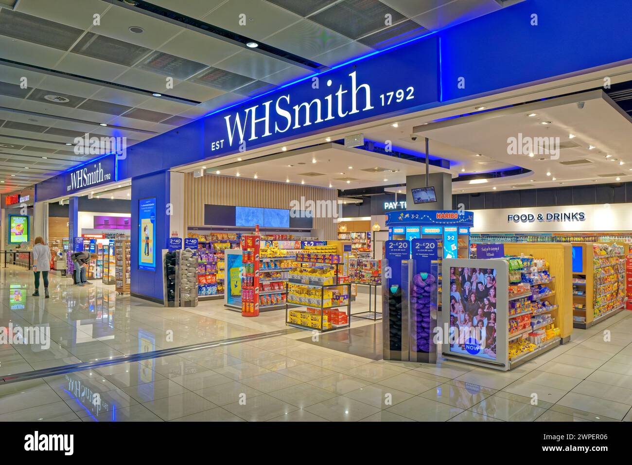 W H Smith store within terminal 2 at Manchester Airport, England Stock ...