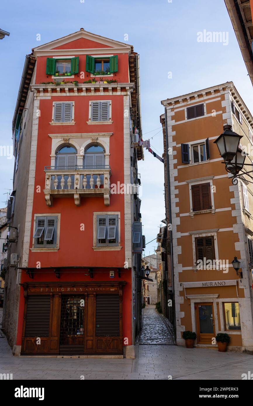 cityscape grisia street view in Rovinj Croatia with yellow houses doors ...