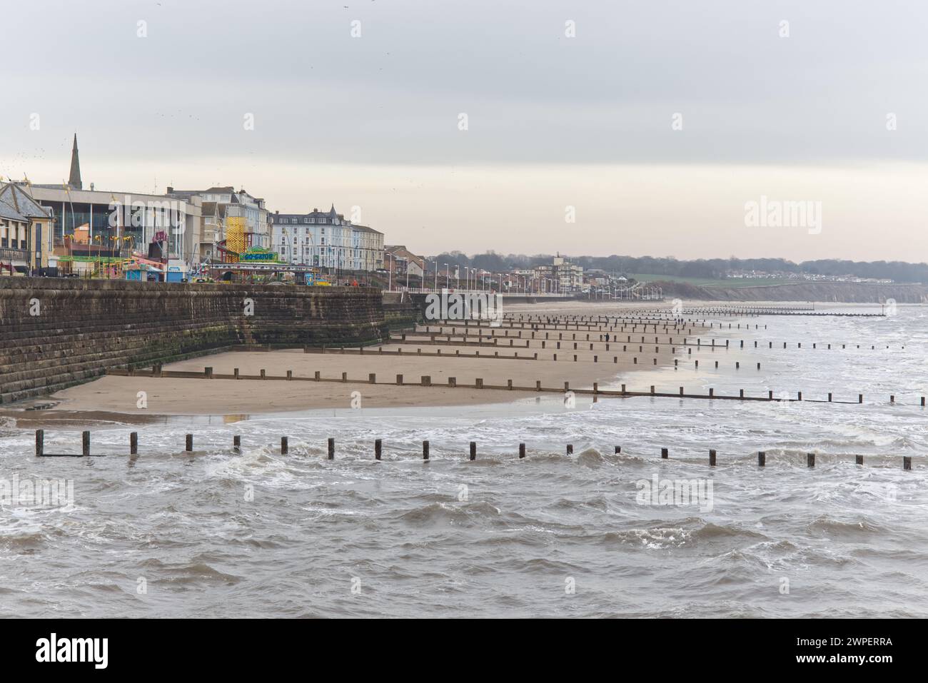Groynes on the beach at Bridlington in Yorkshire protecting the ...