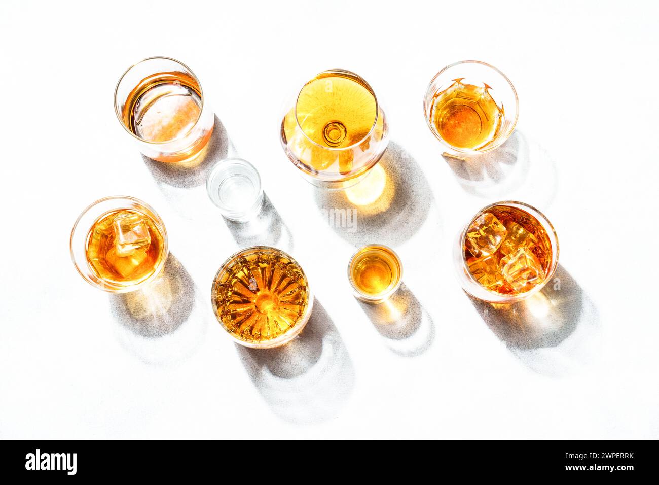 Strong alcohol drink. Whisky, rum, tequila, cognac at white background ...